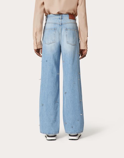 Denim Trousers With Punk Studs for Man in Denim | Valentino GB